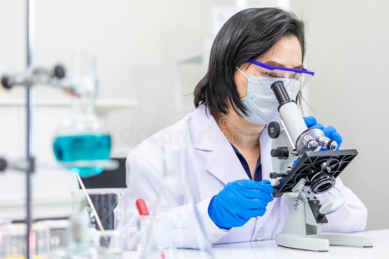 Scientis Using Microscope To Work in Lab Stock Image - Image of ...