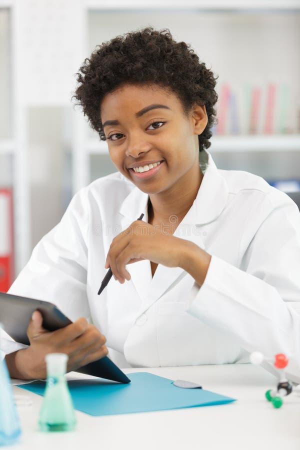Female Scientist Smiling at Camera Stock Photo - Image of doctor ...