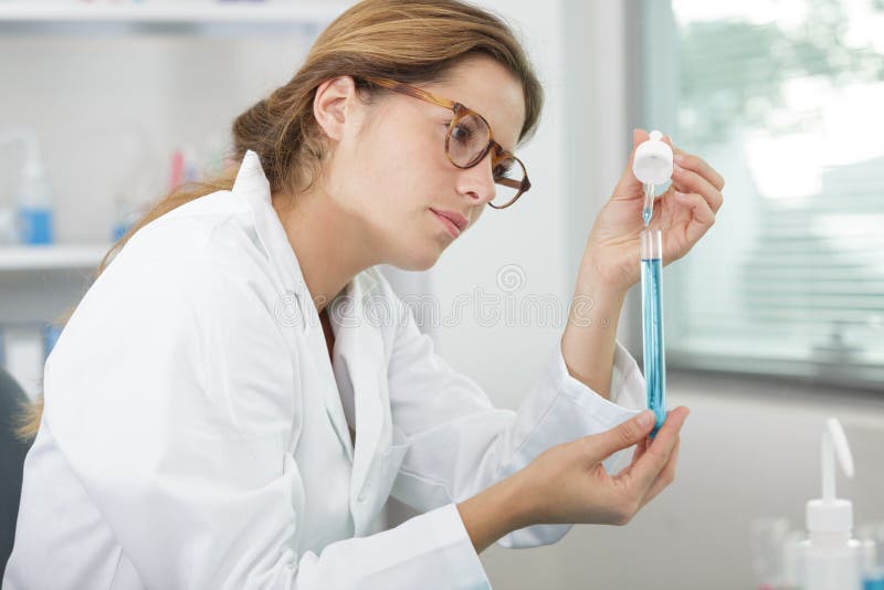 Female Scientist Using Liquid Dropper Stock Image - Image of chemical ...