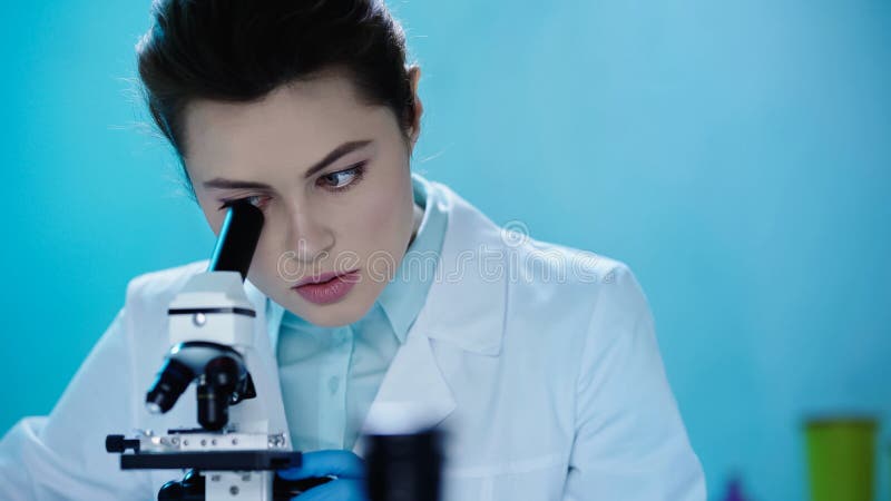 Female Scientist in White Coat Looking Stock Photo - Image of medicine ...