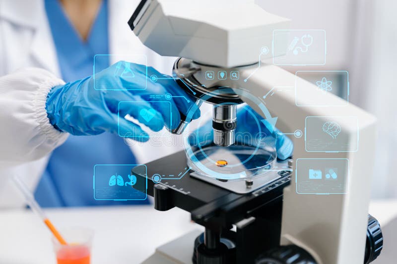 Female Scientist Working with Micro Pipettes Analyzing Biochemical ...