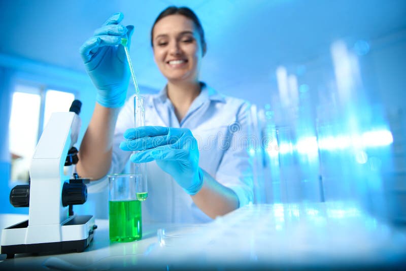 Female Scientist Working with Sample in Chemistry Laboratory Stock ...