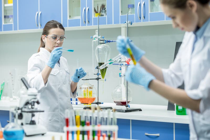 Female scientists in lab stock photo. Image of chemists - 90100436
