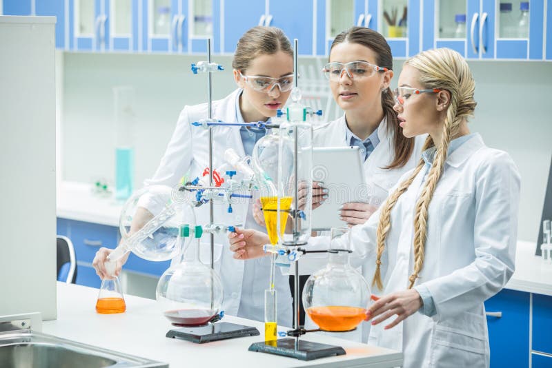 Female scientists in lab stock photo. Image of chemists - 90100160
