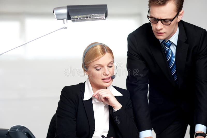 Female Secretary Explaining To Boss Stock Image - Image of educated ...