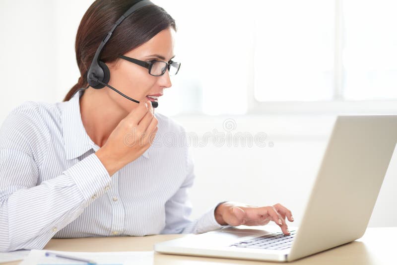 Female Secretary Speaking on the Headphones Stock Photo - Image of ...