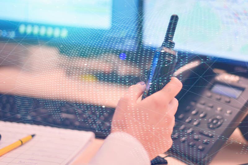 Female Security Guard Operator Talking on the Phone, Calling in the ...