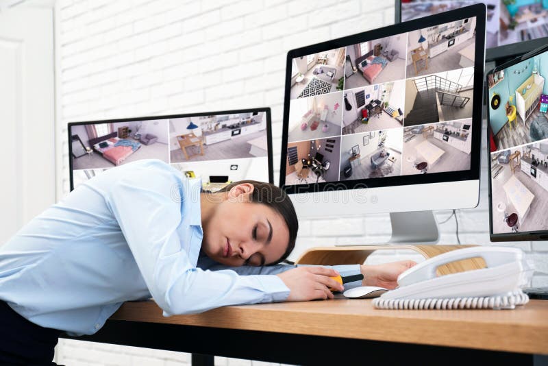 Female Security Guard Sleeping Near Monitors Stock Image - Image of ...