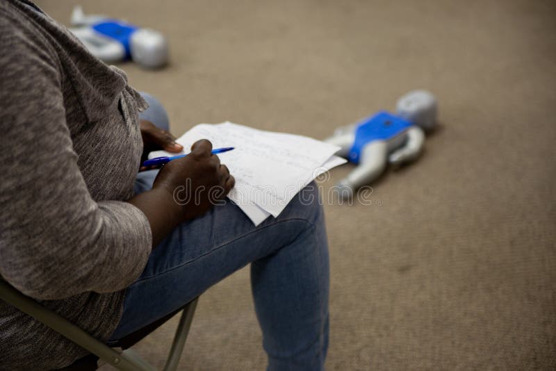 Staff is Taking Down a Note in Cpr First Aid Class Stock Image - Image ...