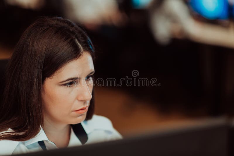Female Security Operator Working in a Data System Control Room Offices ...