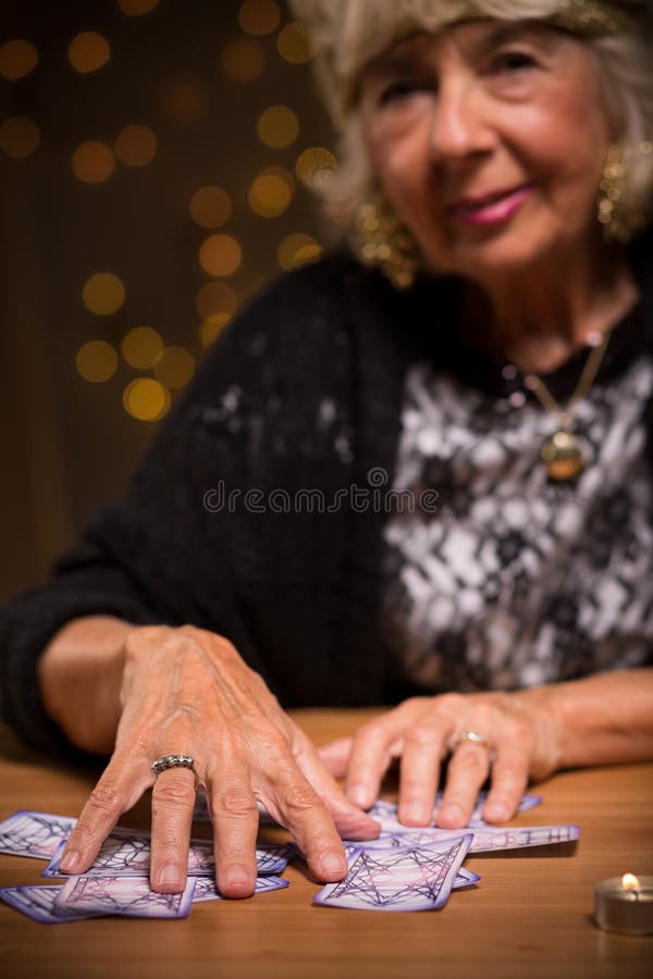 Female Seer Using Tarot Cards Stock Image - Image of future, read: 61235597