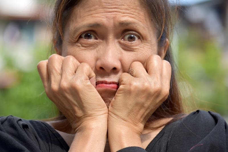 A Female Senior Afraid stock photo. Image of adult, females - 142650946