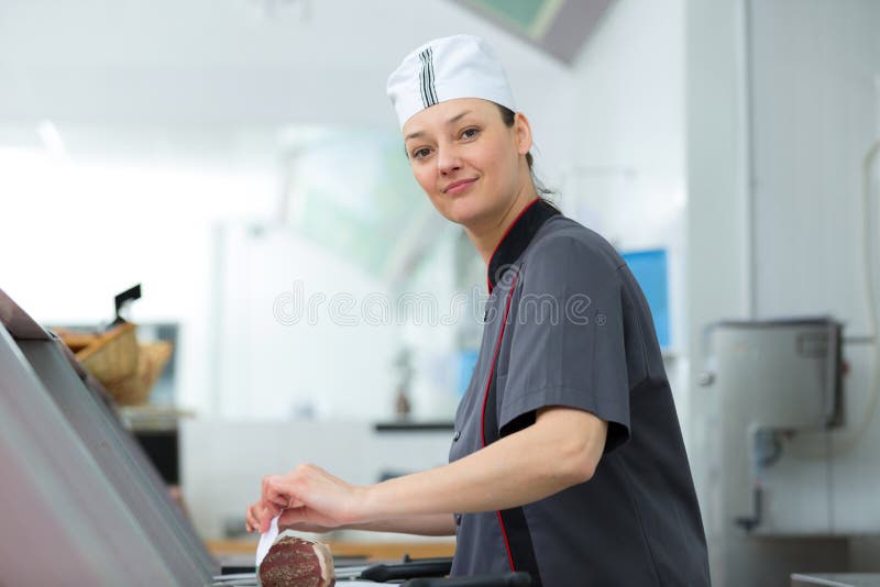 Female Shopkeeper in Grocery Store Stock Photo - Image of assistant ...