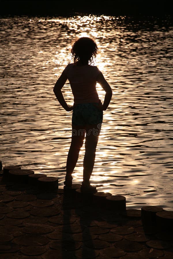 Female Silhouette on Sunset Stock Image - Image of beauty, backlight ...