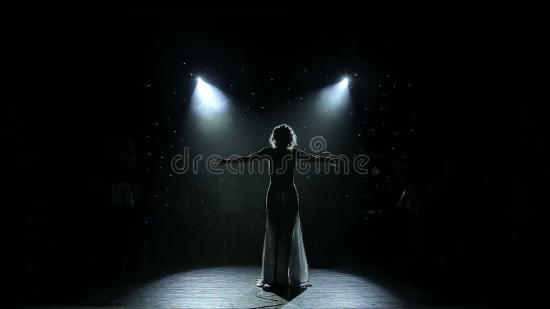 Female Singer Backlit on Smoky Stage Stock Footage - Video of lights ...