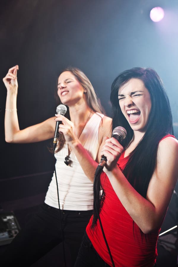 Female singers performing stock image. Image of pretty - 23604107