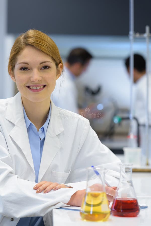 Female Smiling Chemistry in Laboratory Stock Photo - Image of chemistry ...