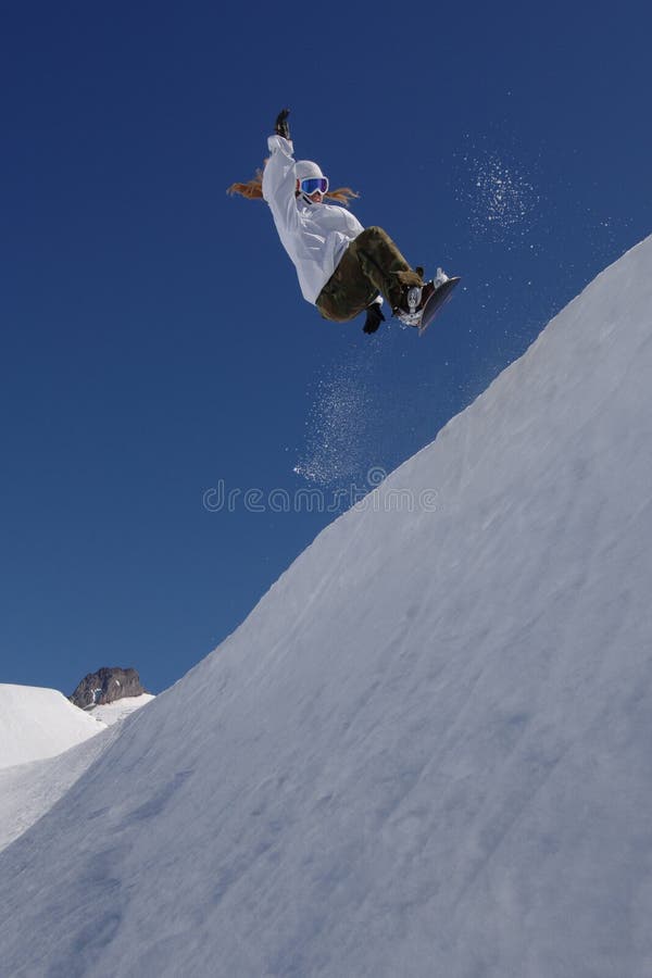 Woman Snowboarder Jump Slope Stock Image - Image of jump, snowboarder ...