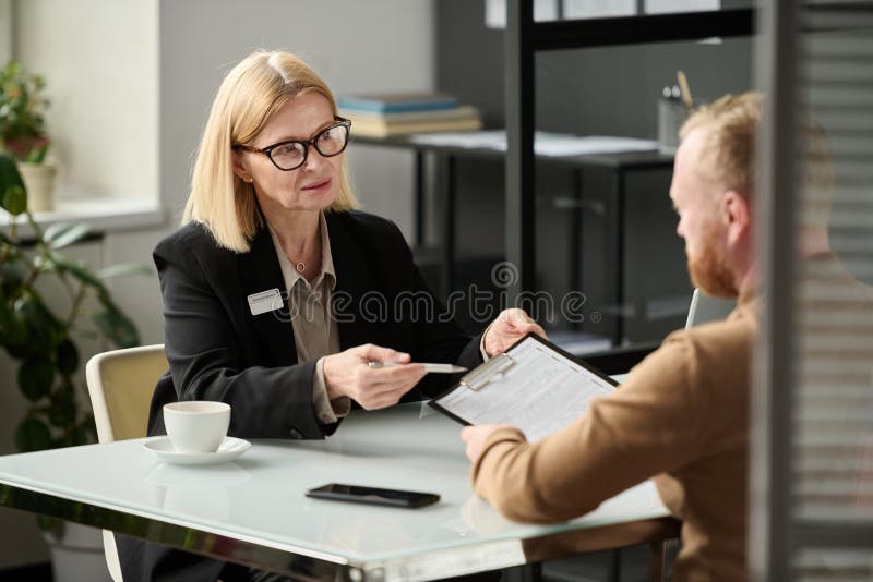 Female Social Worker Consulting Person Stock Photo - Image of woman ...
