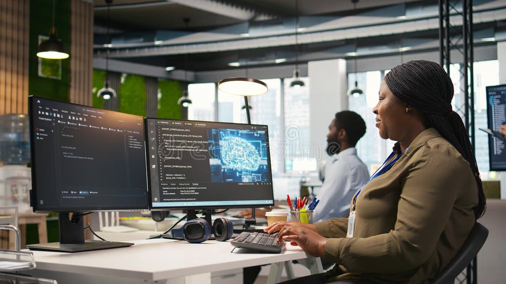 Female Software Developer Using Artificial Intelligence To Optimize ...