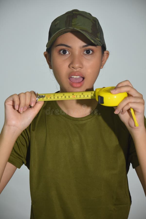 A Female Soldier with Tape Measure Stock Photo - Image of measure, army ...