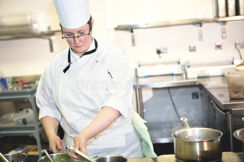 Female sous chef cooking stock image. Image of chef, professional ...