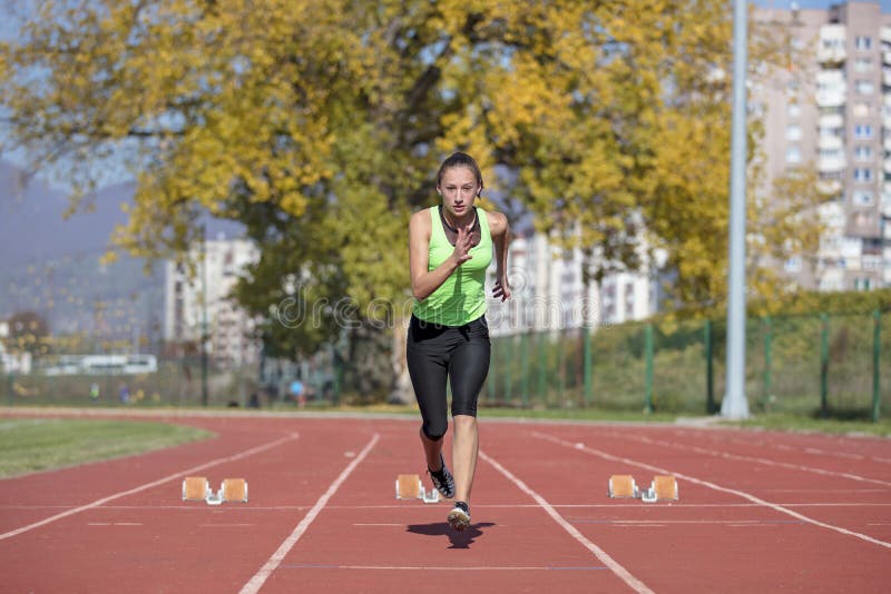 Female Sprinter Getting Ready To Start the Race Stock Image - Image of ...