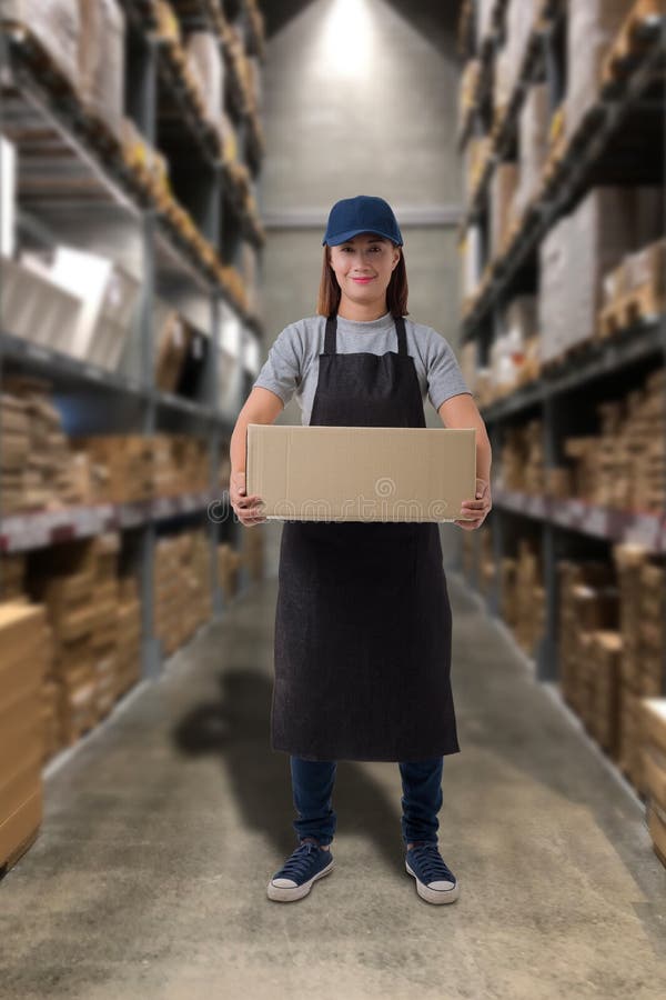 Female Staff Lifting Parcel Boxes in the Warehouse Stock Image - Image ...