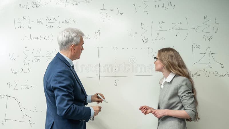 Female Student Answers a Question from an Elderly Professor at a White ...
