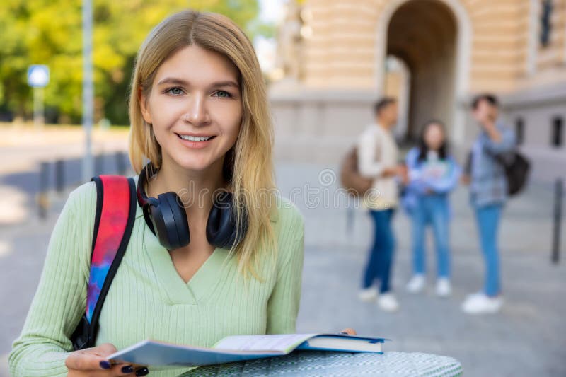 Female Student with Blonde Hair Reading Book before Classes or Exam ...