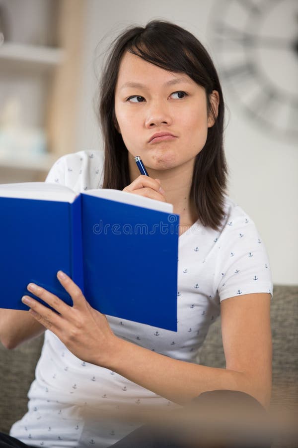 Female student with book stock photo. Image of indoor - 226432292