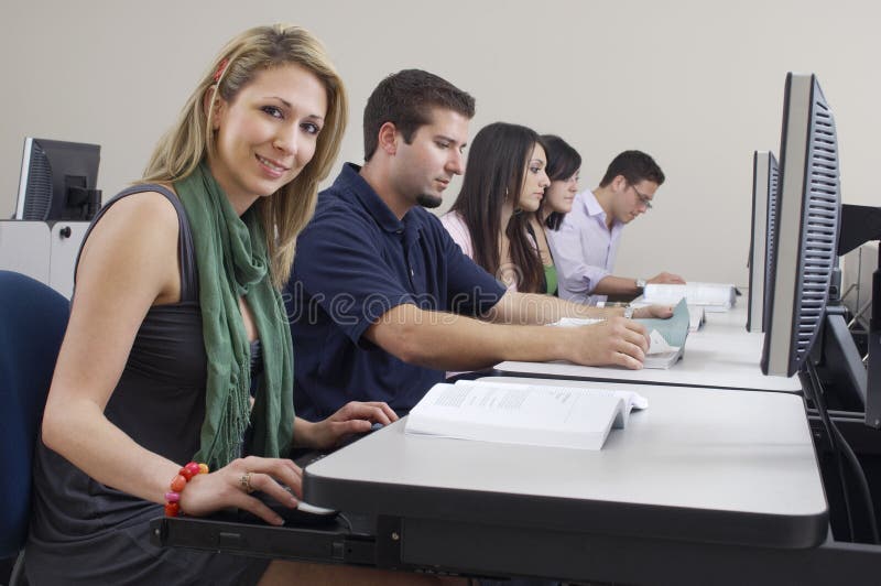 Female Student with Classmates in Computer Lab Stock Image - Image of ...