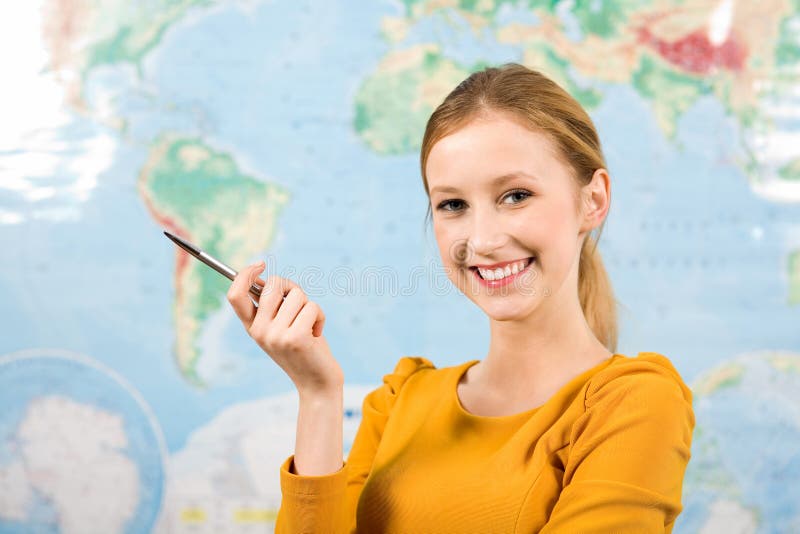 Female Student in Front of World Map Stock Image - Image of learning ...