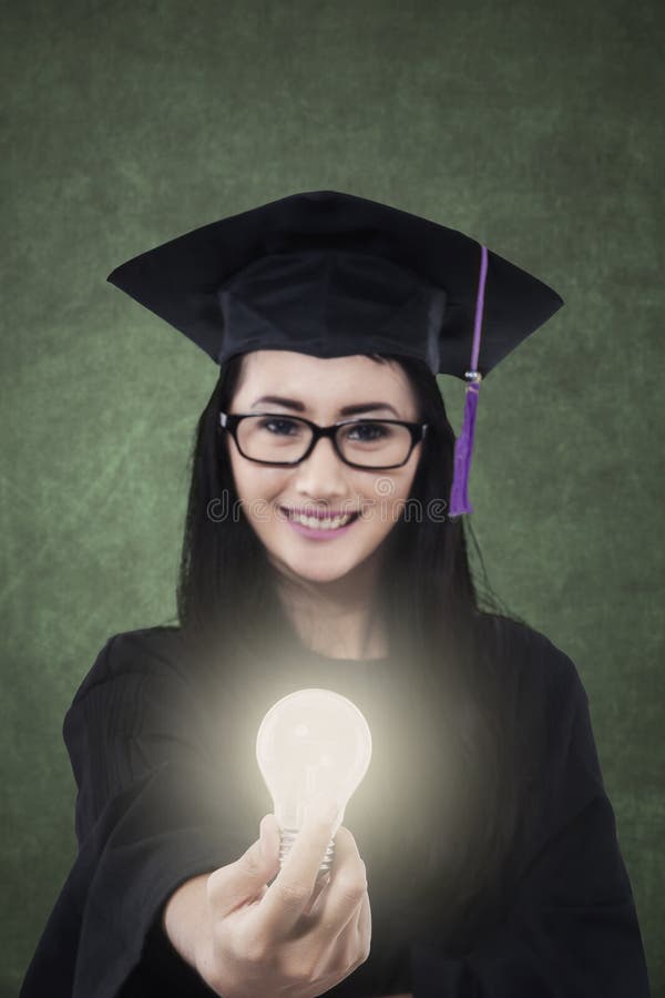 Female Student Giving Bright Light Bulb Stock Image - Image of future ...