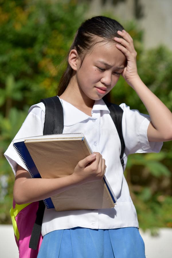 Female Student with Headache Wearing School Uniform Stock Photo - Image ...