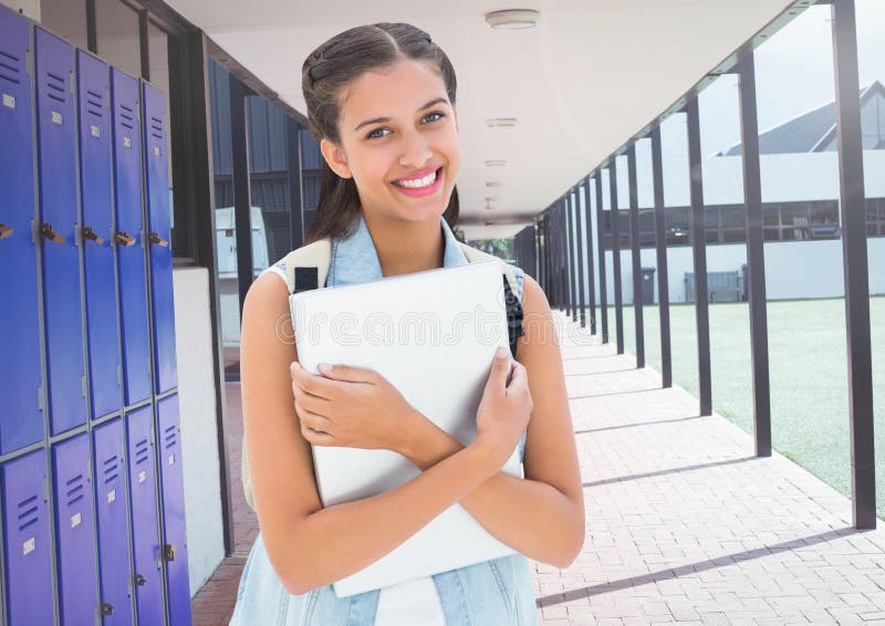 Female Student Holding File in Front of Lockers Stock Photo - Image of ...