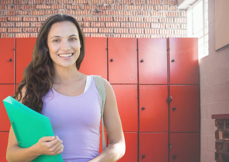 Female Student Holding Folder in Front of Lockers Stock Photo - Image ...