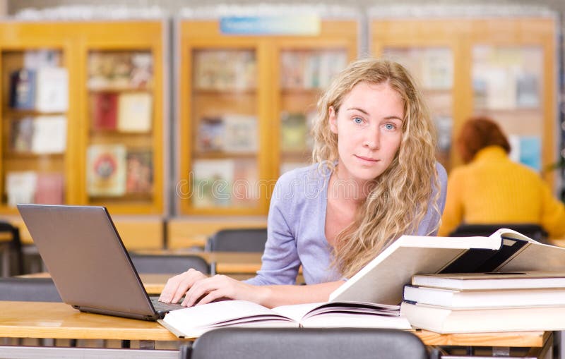 Female Student with Laptop Working in Library Stock Image - Image of ...