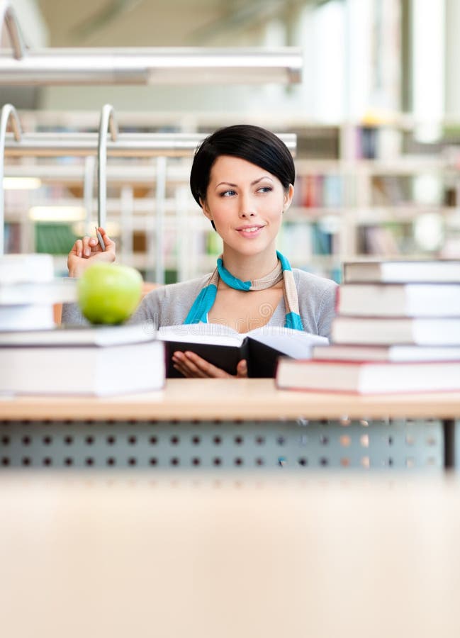 Female Student Learns at the Reading Hall Stock Image - Image of ...