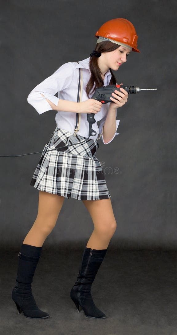 Female Student Learns To Use Power Tools Stock Image - Image of skirt ...
