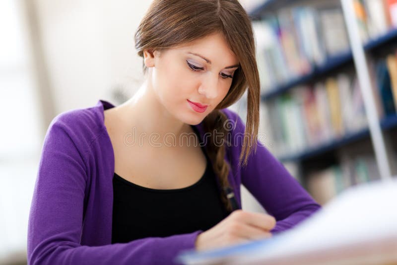 Female Student in a Library Stock Image - Image of eyeglasses ...