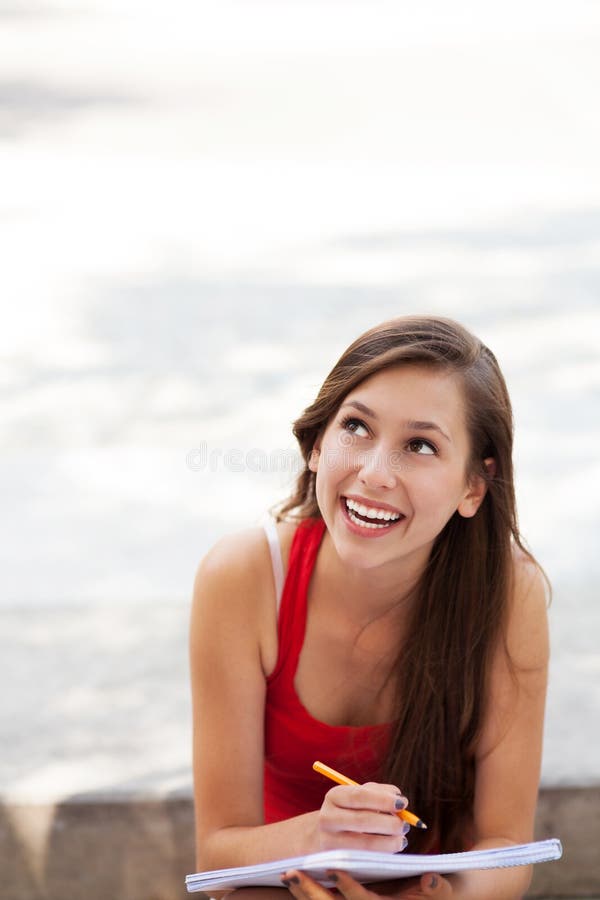 Female student looking up stock photo. Image of happiness - 26107710
