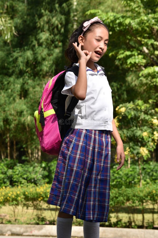 Female Student and Okay Sign Wearing School Uniform Stock Photo - Image ...