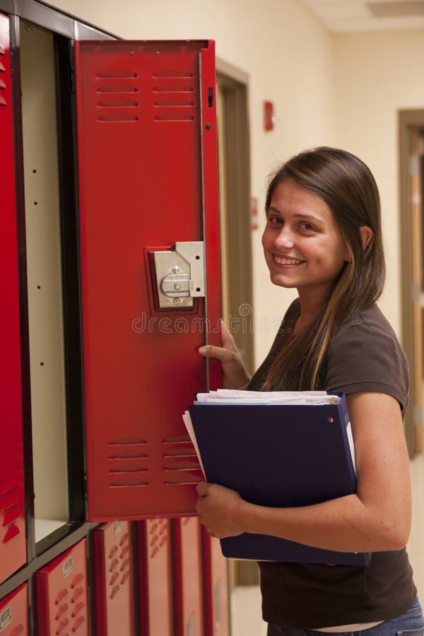 Opening a locker stock image. Image of teen, young, left - 5943381