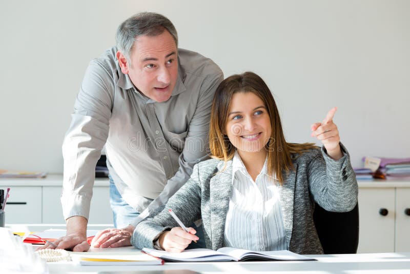 Female Student Pointing at Lecture on Board Stock Photo - Image of ...