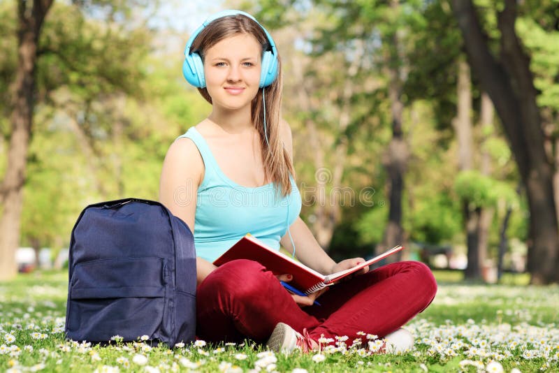 Female Student Reading a Book in Park Stock Photo - Image of adult ...
