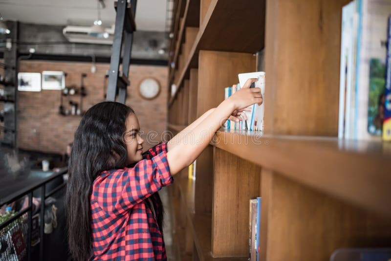 Female Student Reading Knowledge from a Book Stock Image - Image of ...