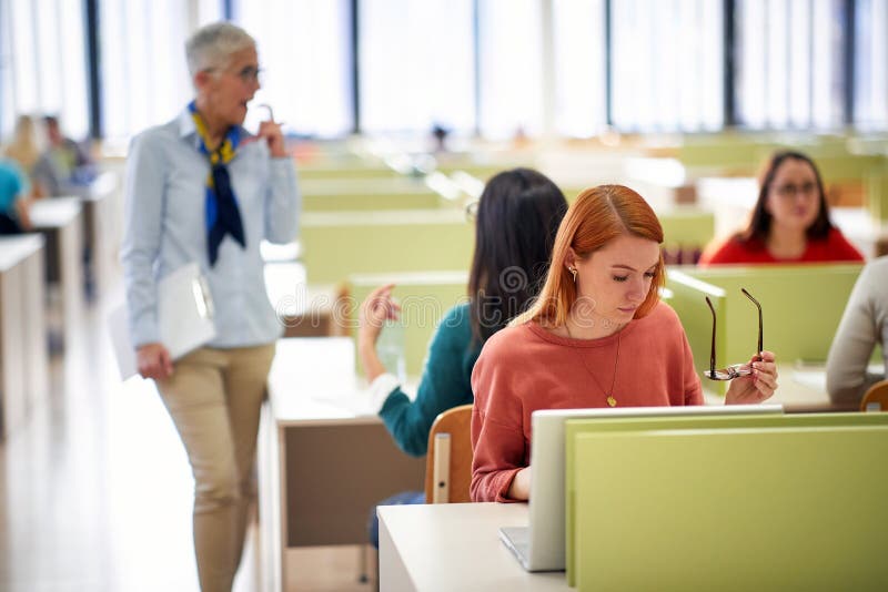 Female Student Reading a Lesson at a Lecture Stock Image - Image of ...