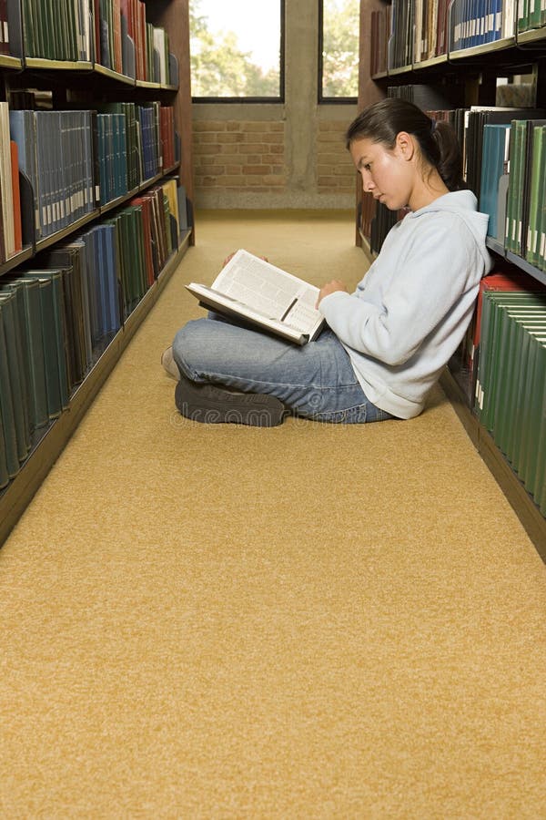 Female Student Reading in the Library Stock Image - Image of female ...