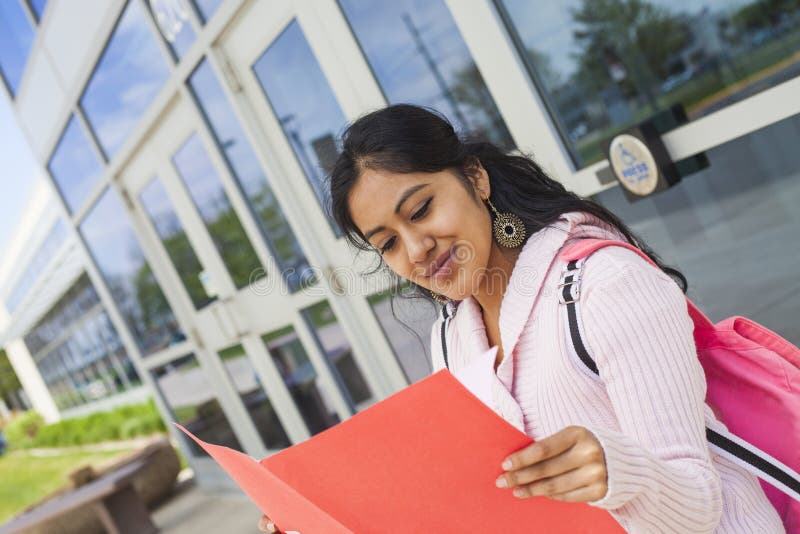 Female Student Reading Textbook Stock Photo - Image of education ...